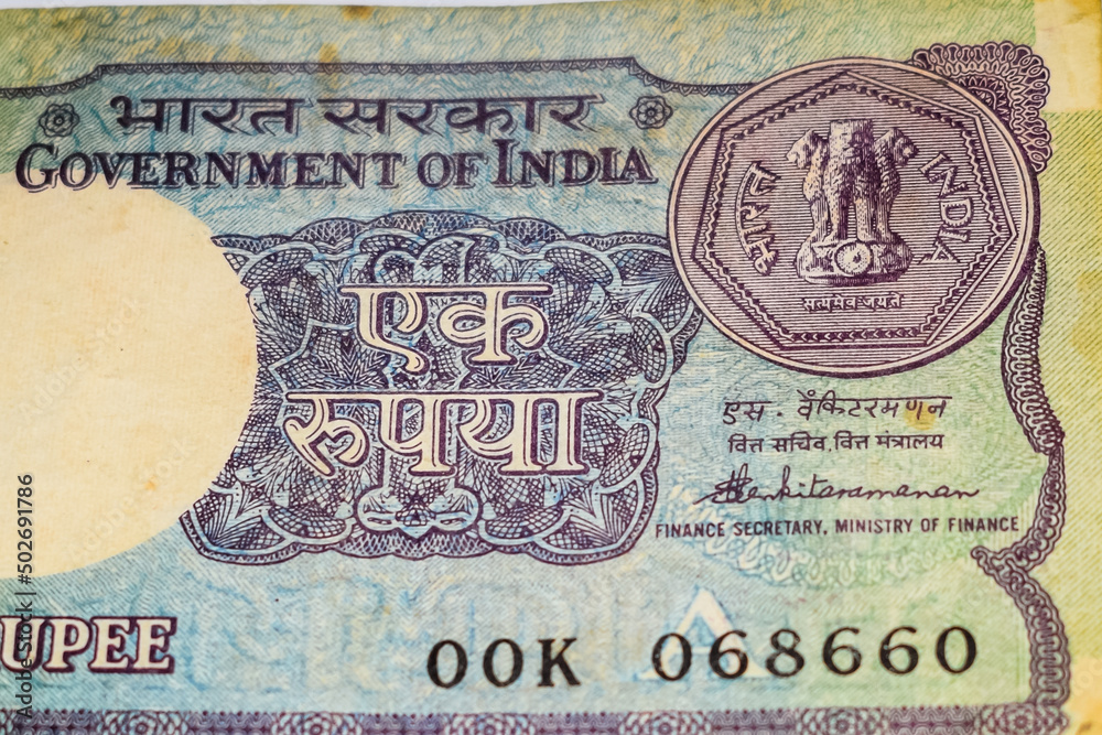 Old One Rupee notes combined on the table, India money on the rotating ...