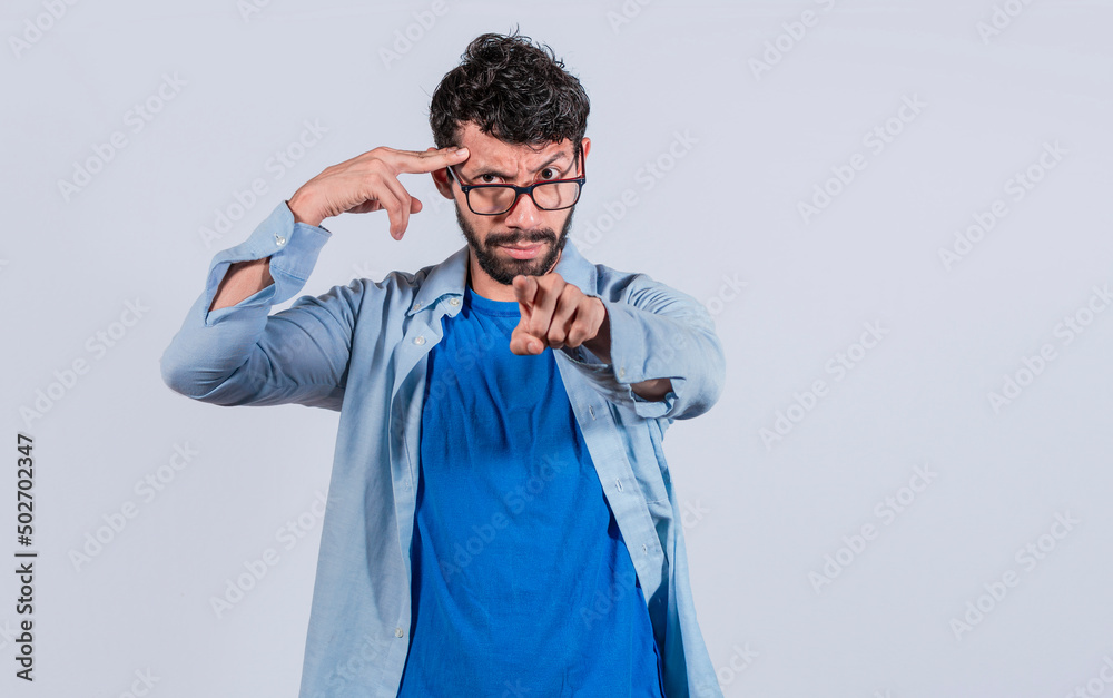 Foto de Annoyed angry man with finger pointing at camera, Bossy man ...