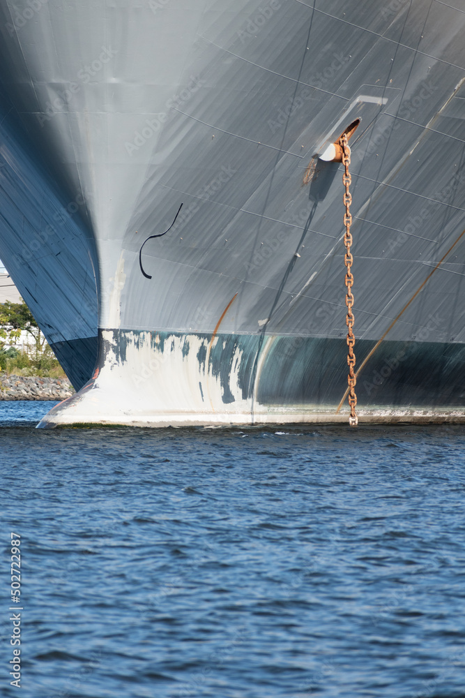 Ship with dropped anchor showing bottom of haul and chain detail. Stock ...