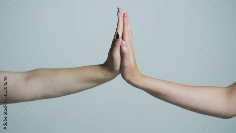 Man and girl giving high five. Two hands, male and female. High-five ...