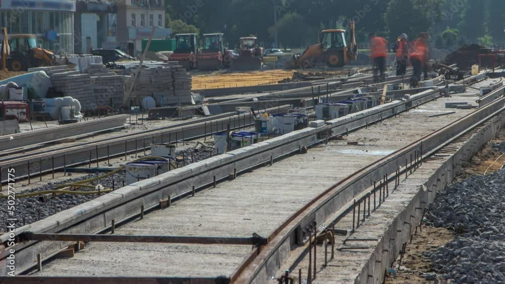 Repair road works with excavators on the street timelapse. Laying of ...