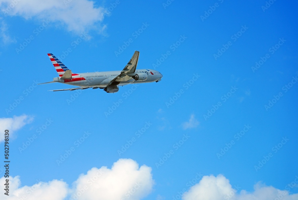 MIAMI, FL -13 MAR 2022- View of an airplane in flight from American ...