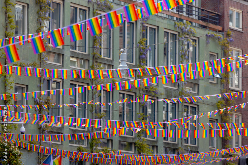Stockfoto Selective focus of pride flags hanging on rope on the ...