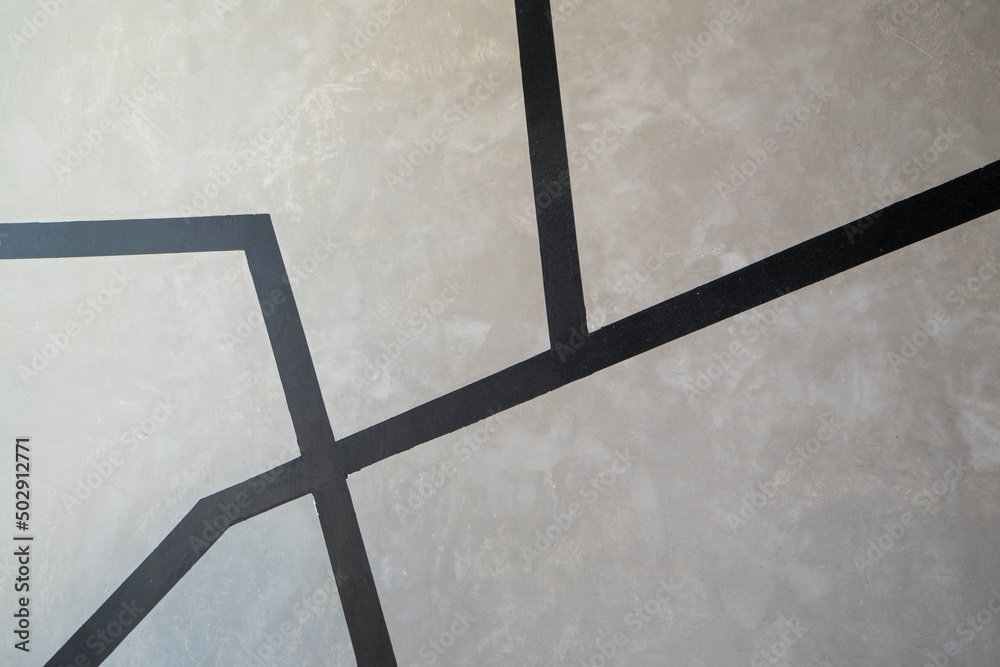 Paint black color to line boundary on the raw concrete background ...
