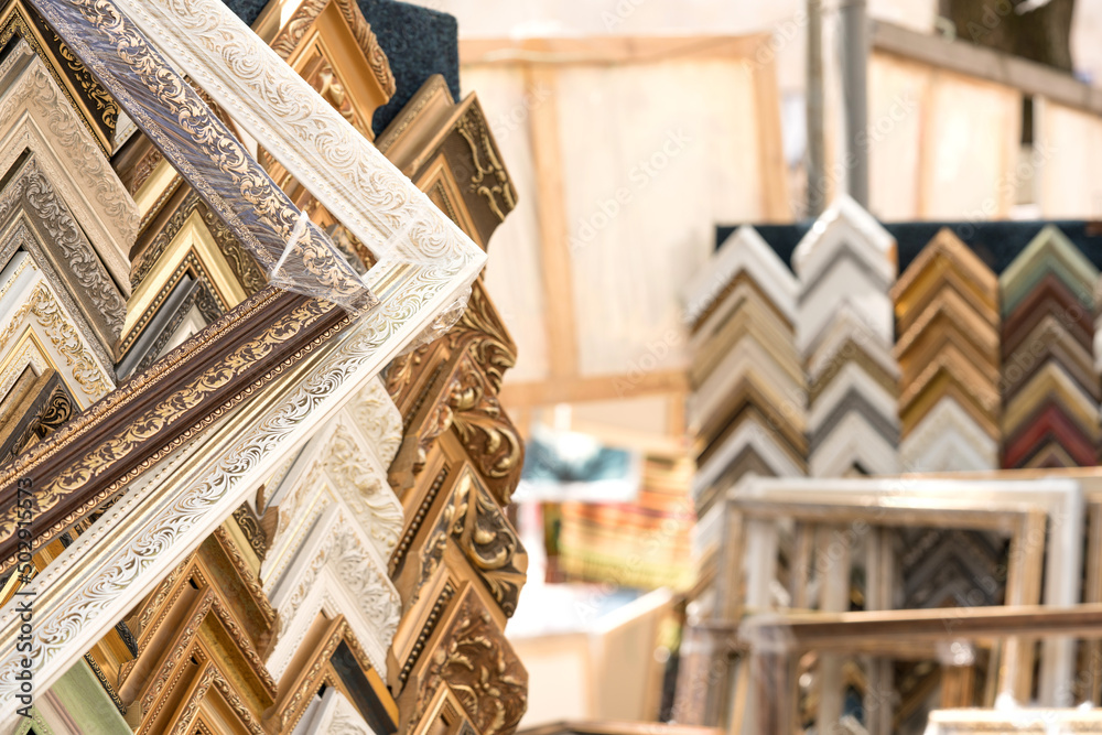 Variety of wooden and plastic picture frames in different colours and ...