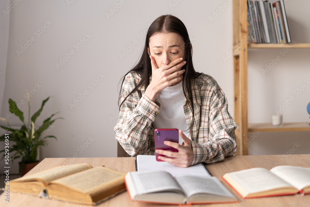frightened young girl got bad news in social network message, addiction ...