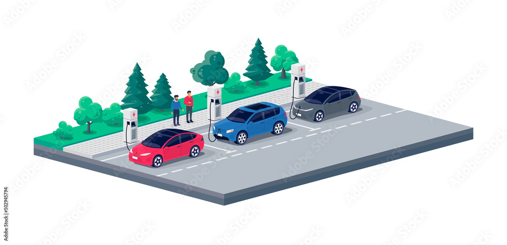 Electric cars parallel parking charging on city street road sideway ...
