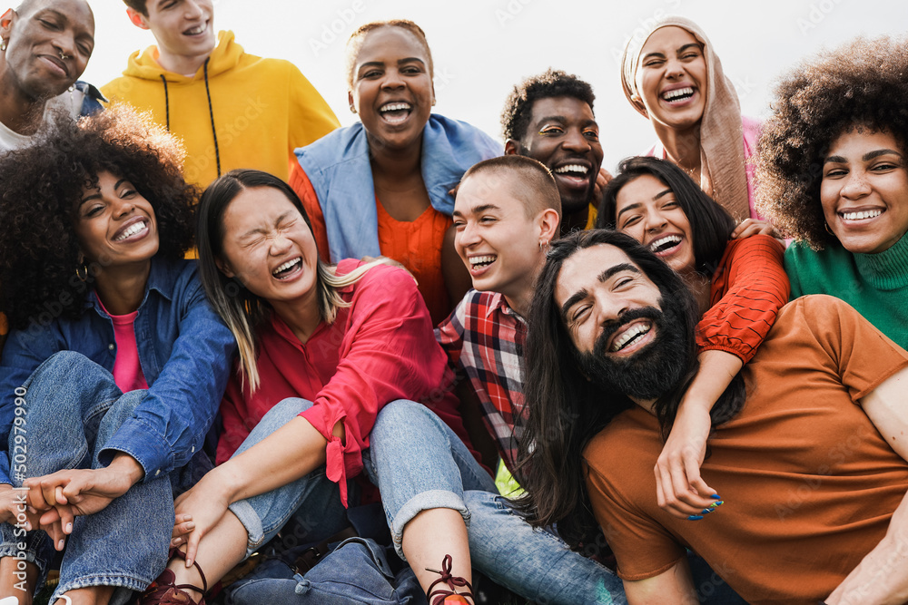 Group of multiracial people enjoy day at city park - Diverse young ... Group of multiracial people enjoy day at city park - Diverse young ...