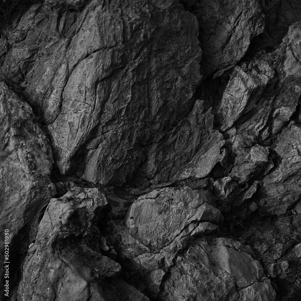 Black white rock texture. Rough mountain surface. Close-up. Dark ...