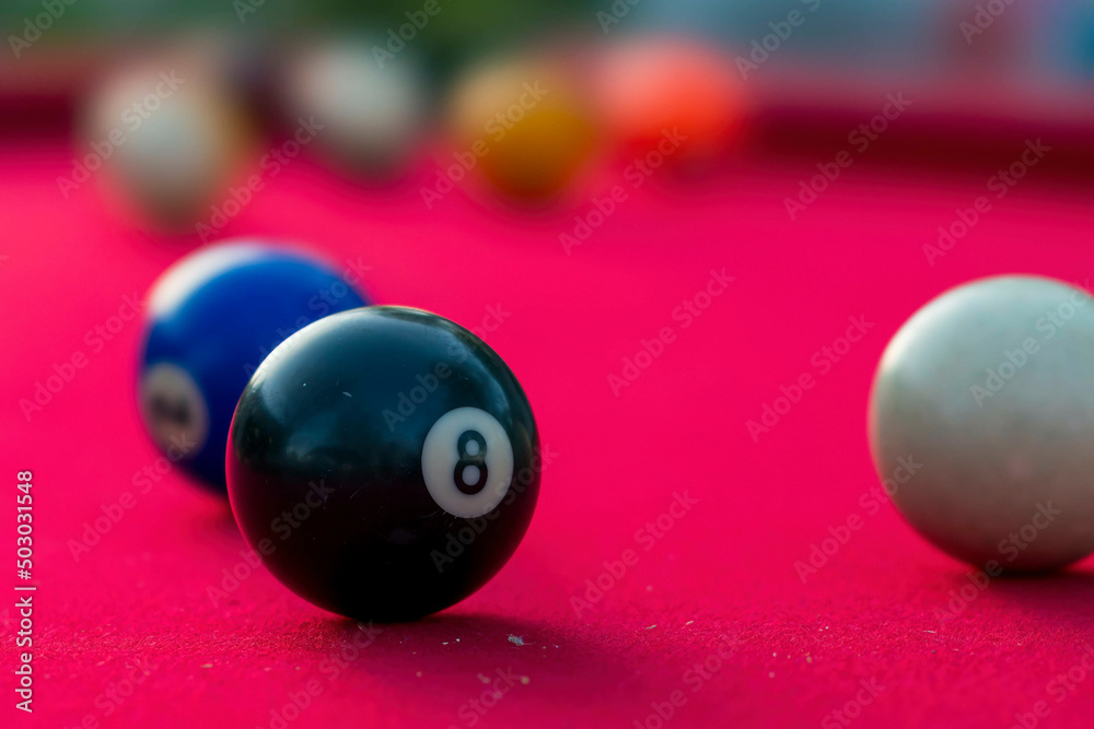 Pool Balls Are Lit On Fire While Sitting On A Pool Table In An Outdoor ...