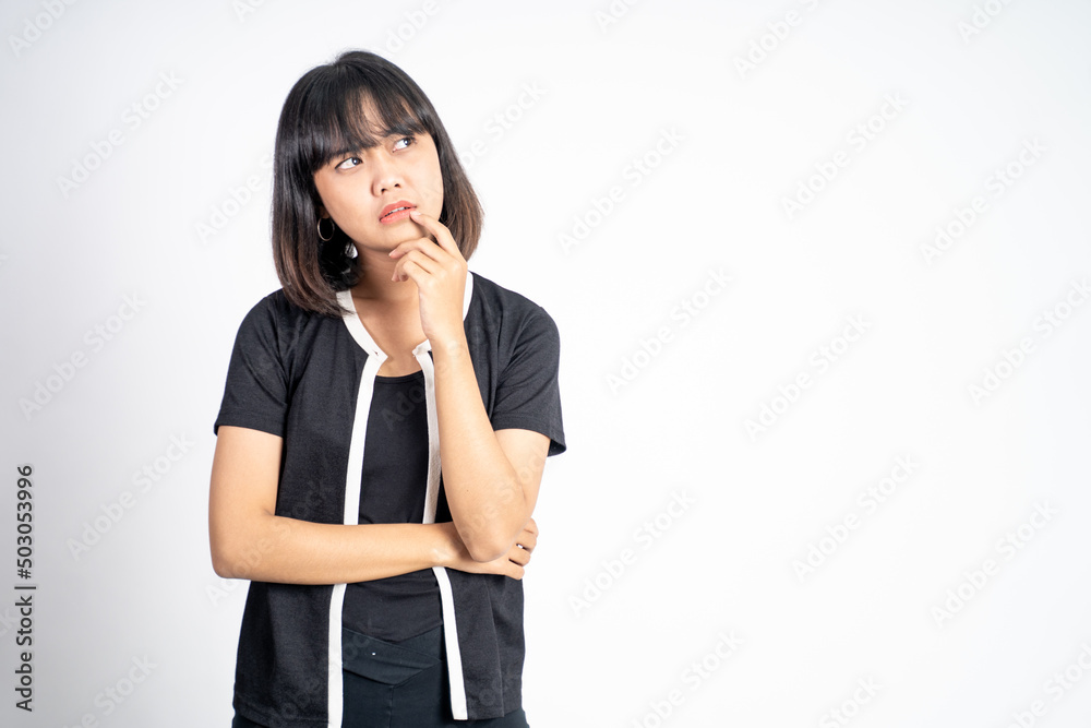 Young asian woman thinking gesture. beautiful woman on isolated ...