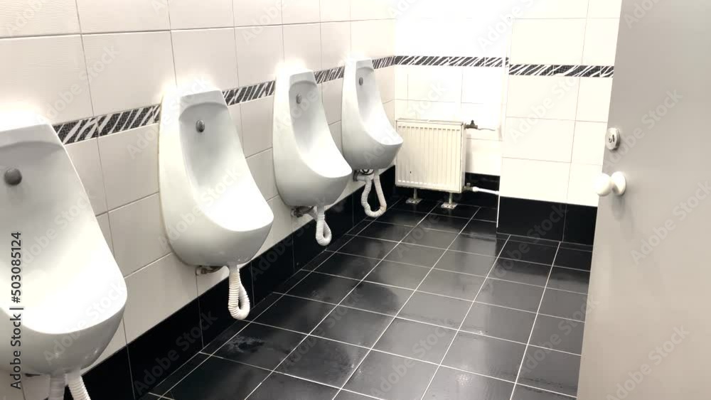 public toilet urinals. men a toilet in the office general plan indoor ...