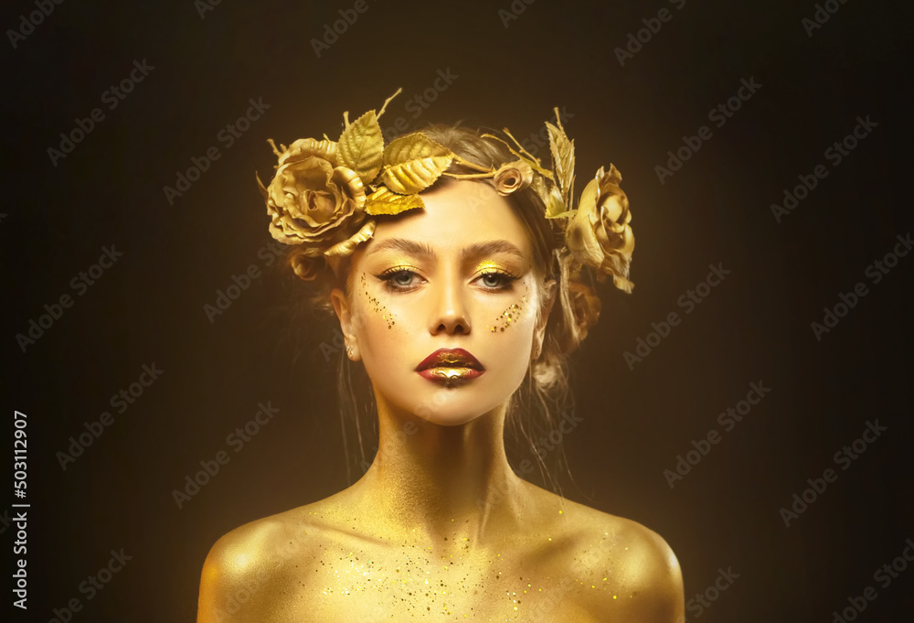 Foto de Portrait Beauty fantasy woman queen, face in gold paint. Golden ...