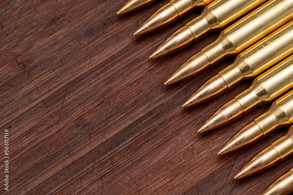 A row of cartridges with 7.62 caliber bullets for a Kalashnikov assault ...