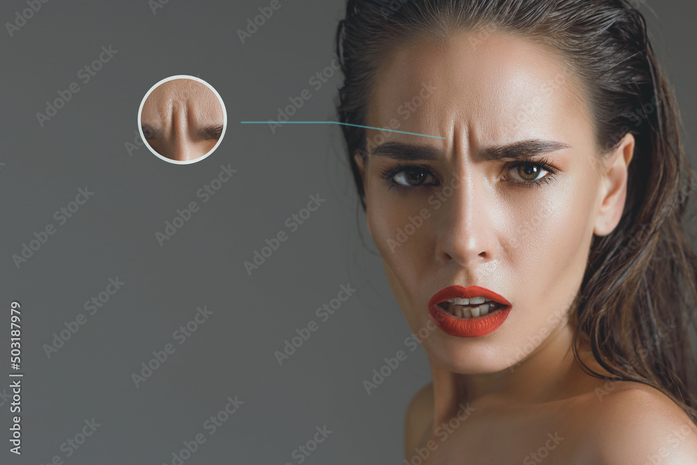 Foto de indignant and surprised glamor brunette woman with a wrinkle on ...