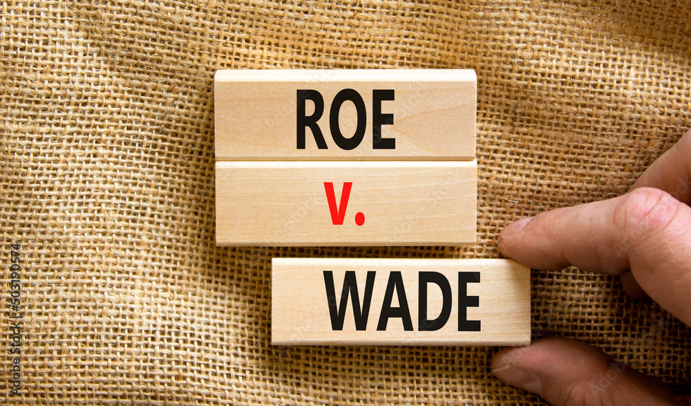 Abortion process Roe versus Wade symbol. Concept words Roe versus Wade ...