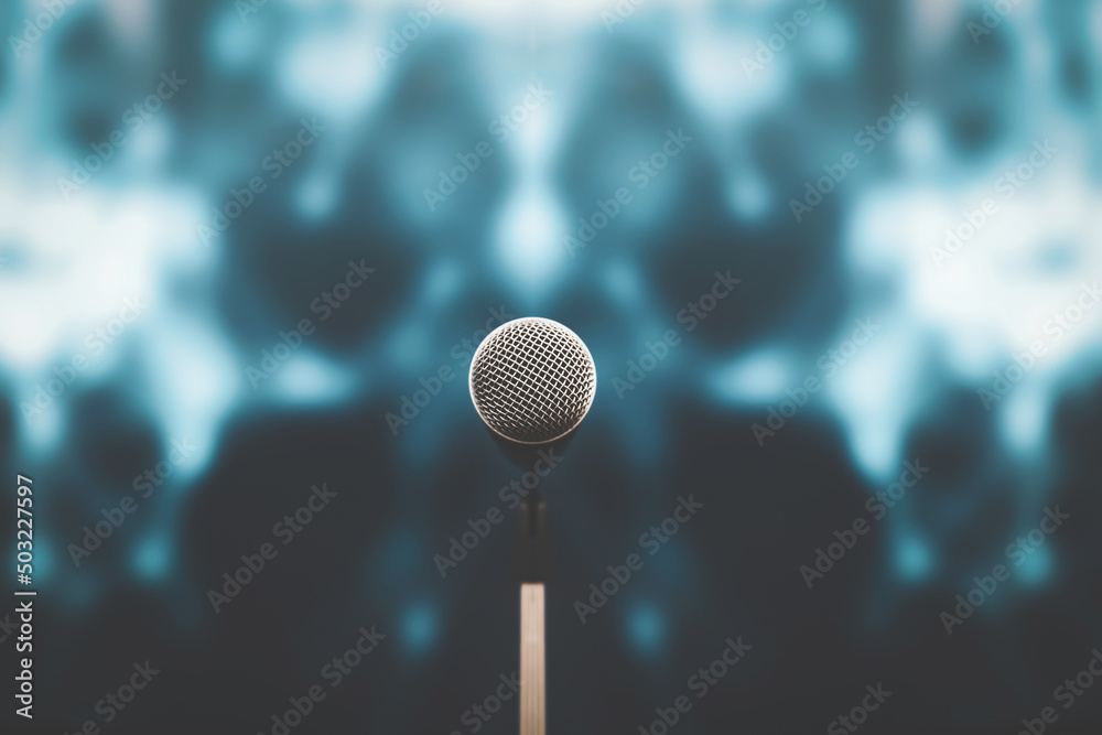 Microphone with stage light background for performance concept of ...