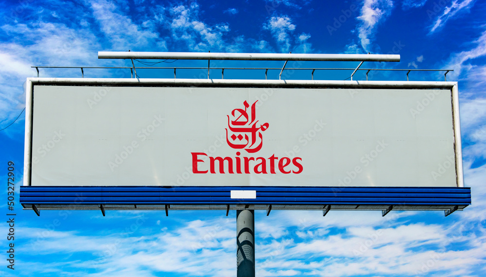 Advertisement billboard displaying logo of Emirates Stock Photo | Adobe ...