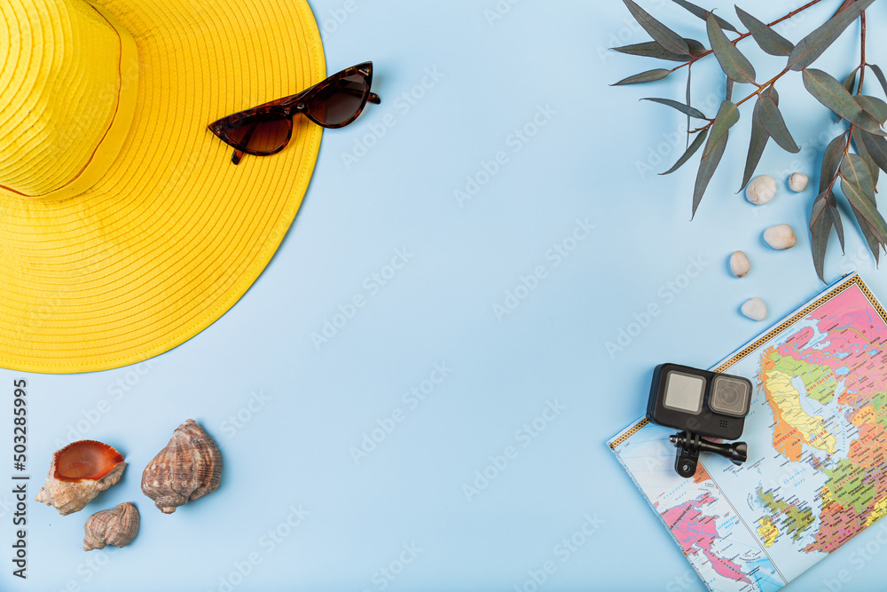 Summer vacation layout, on a blue background map of the world, shells ...