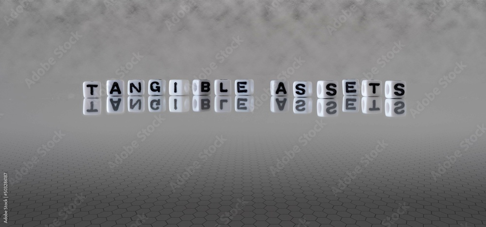 tangible assets word or concept represented by black and white letter ...