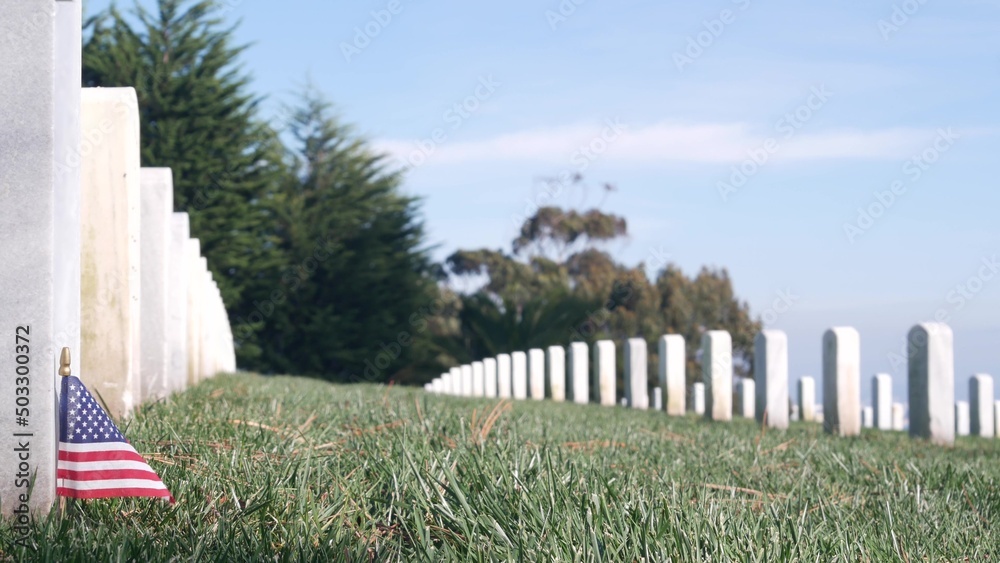 Tombstones and american flag, national memorial cemetery, military ...