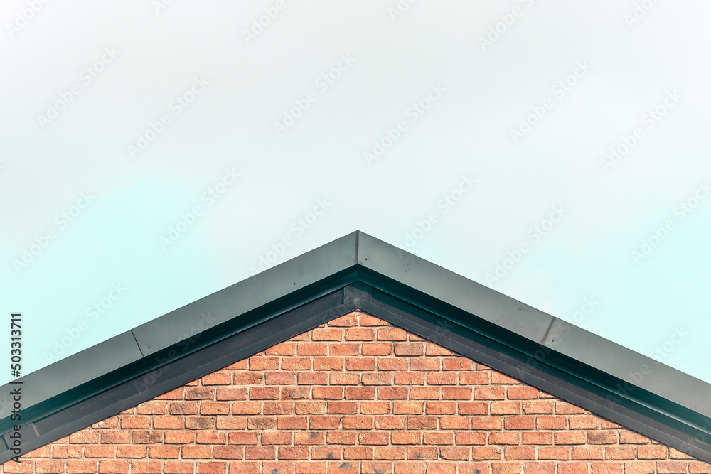 gable roof red brick house country style concept idea against clear sky ...