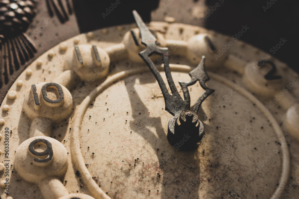 Old clock mechanism. Retro clock arrows and numbers. Time measure ...