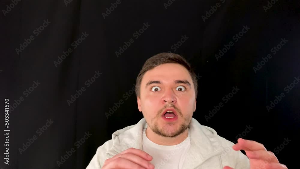 Terrified young adult fears for his life, expression of fear and ...