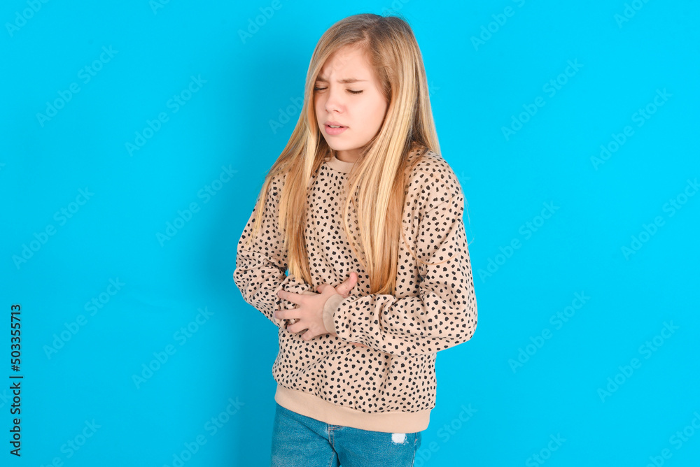 little caucasian kid girl wearing animal print sweater over blue ...
