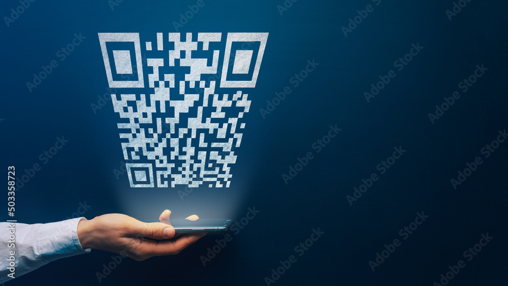 Qr code payment concept. Hand holding mobile smart phone with qr code ...