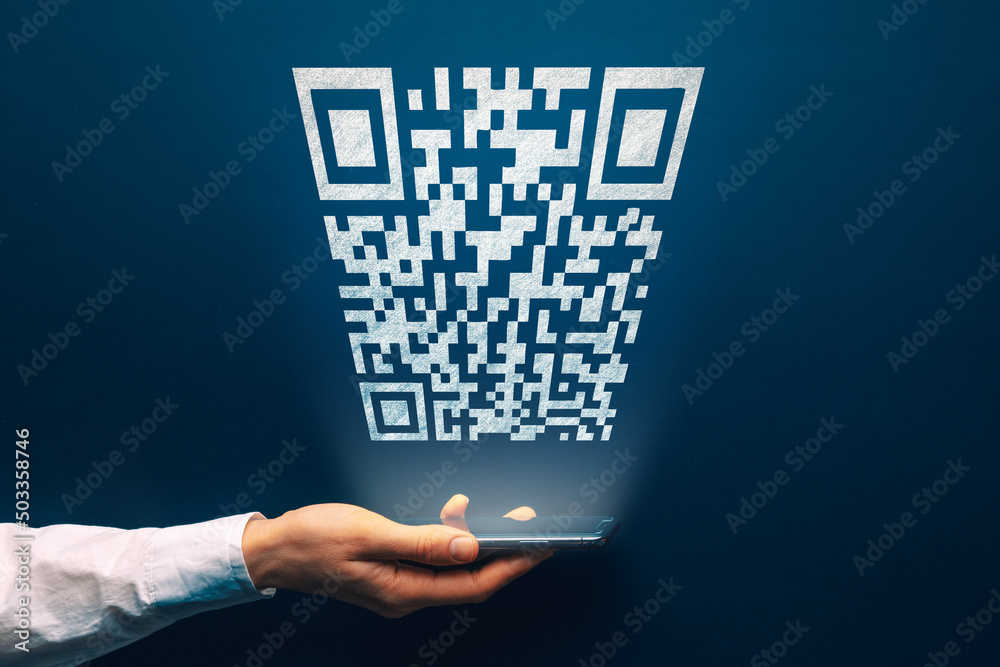 Qr code payment concept. Hand holding mobile smart phone with qr code ...