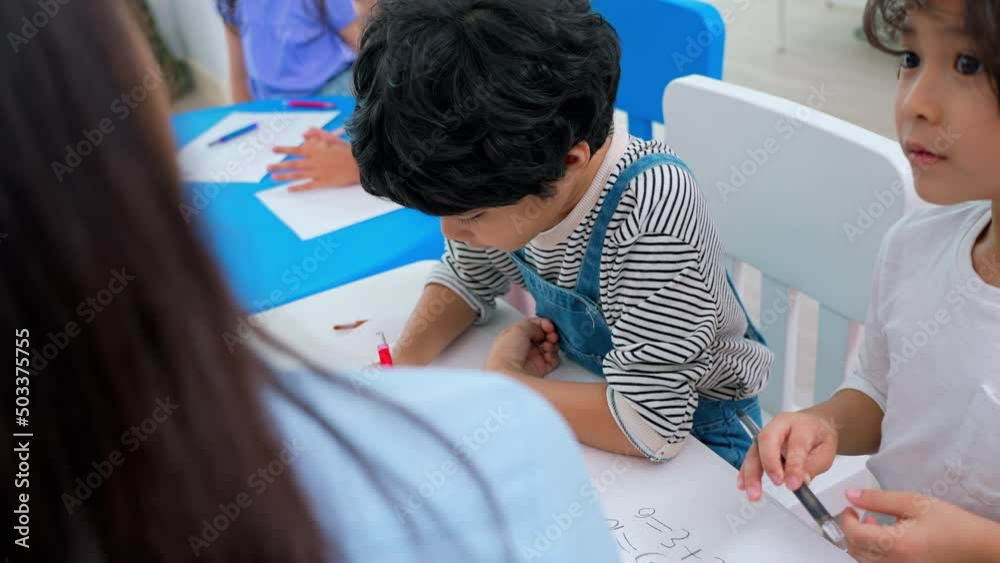 Close up shot of smart boy thinking to calculate numbers with ...
