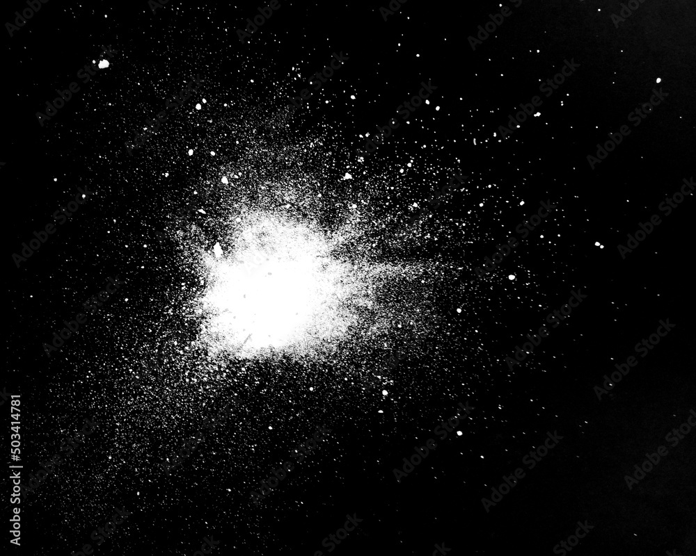 White powder explosion isolated on Dark background. White dust ...