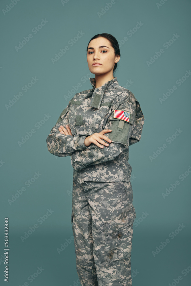 Brave young United States army soldier standing in a studio Stock Photo ...