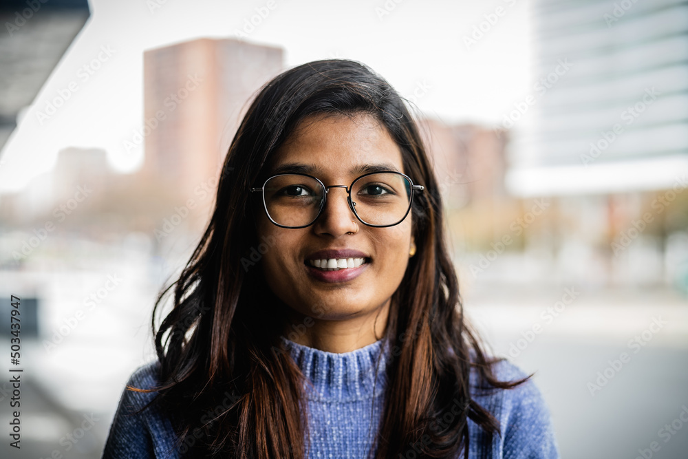 Portrait of Indian girl smiling in camera Stock Photo | Adobe Stock