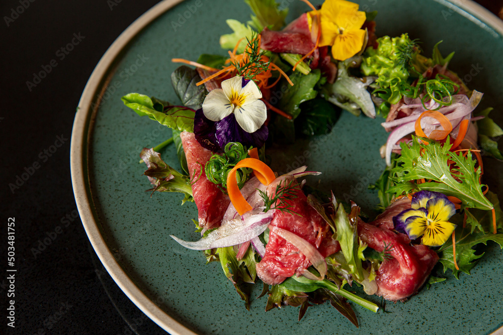 Tartare beef flower circle salad in the fine dining Japanese restaurant ...