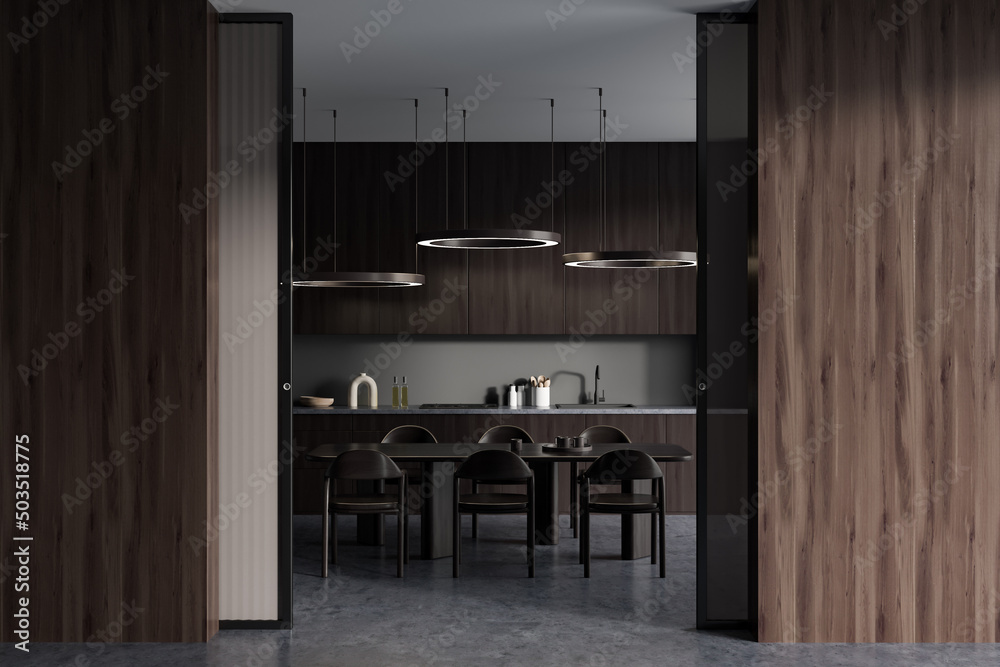 Front view on dark kitchen room interior with dining table Stock ...