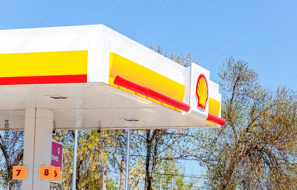Shell gas station logo with blue sky background Stock Photo | Adobe Stock