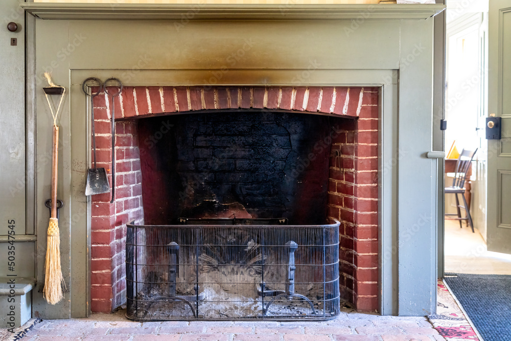 Fireplace in colonial house. Seen in Black Creek Pioneer Village which ...