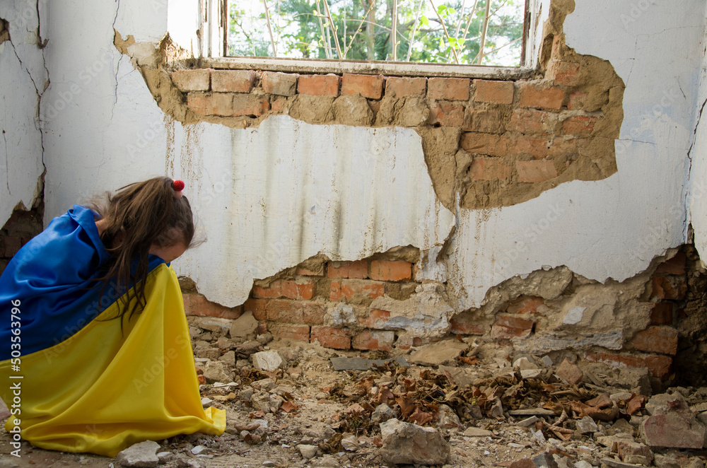 The child is crying because of the war. War in Ukraine. Ukrainian ...