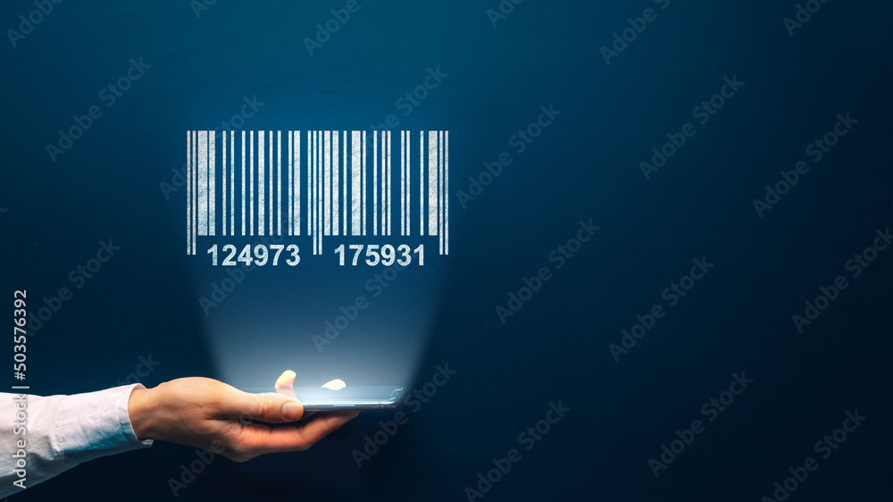 Barcode scan concept. Hand holding mobile smartphone with barcode for ...