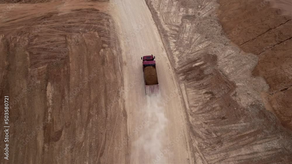 Sand transport from open pit. Dump truck transports sand and gravel in ...
