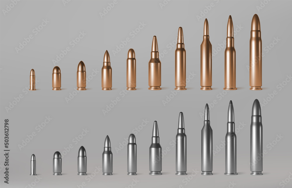 Bullets of different calibers stand in row. Copper, gold or silver ...