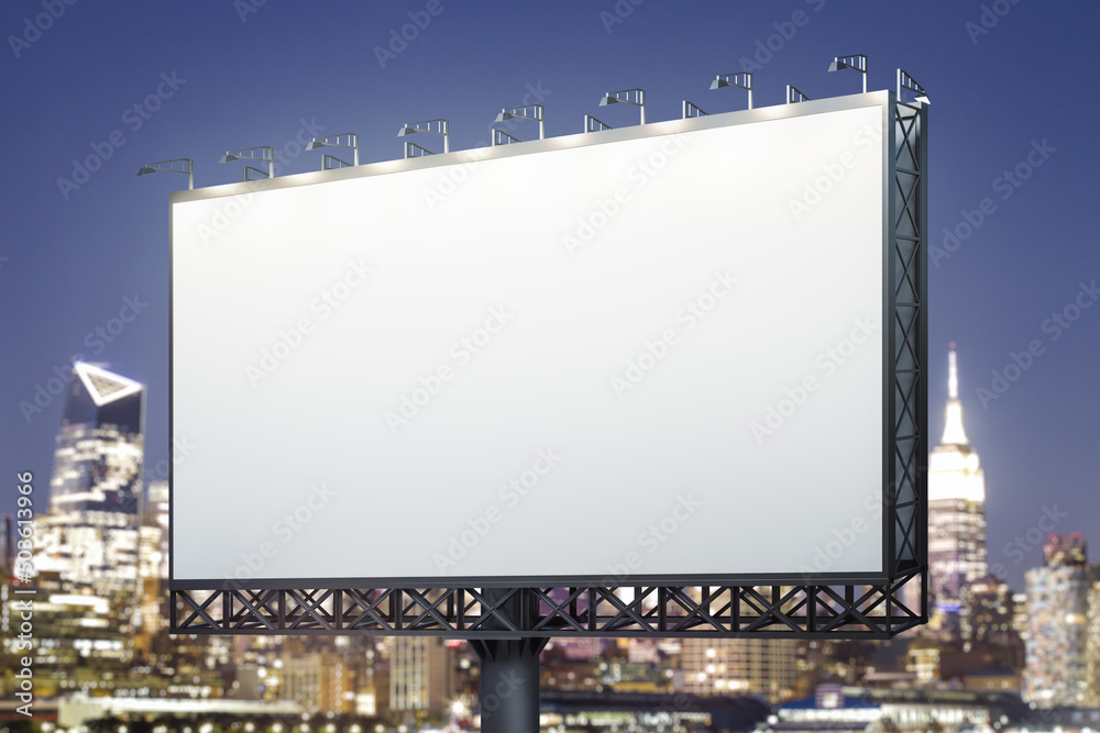 Blank white horizontal billboard on city buildings background at night ...