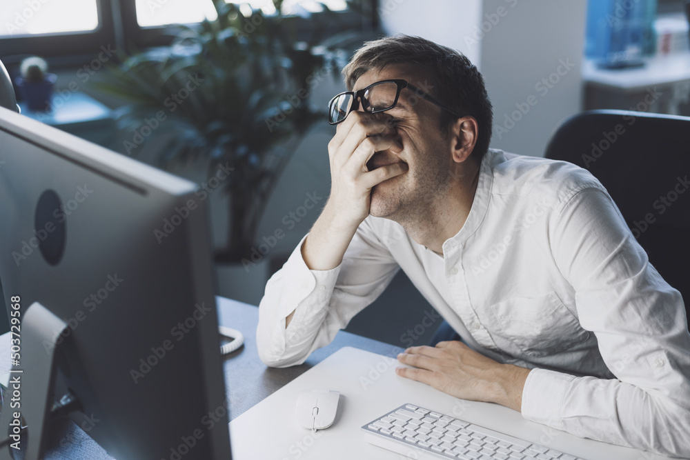 Panicked businessman having issues with his computer Stock Photo ...