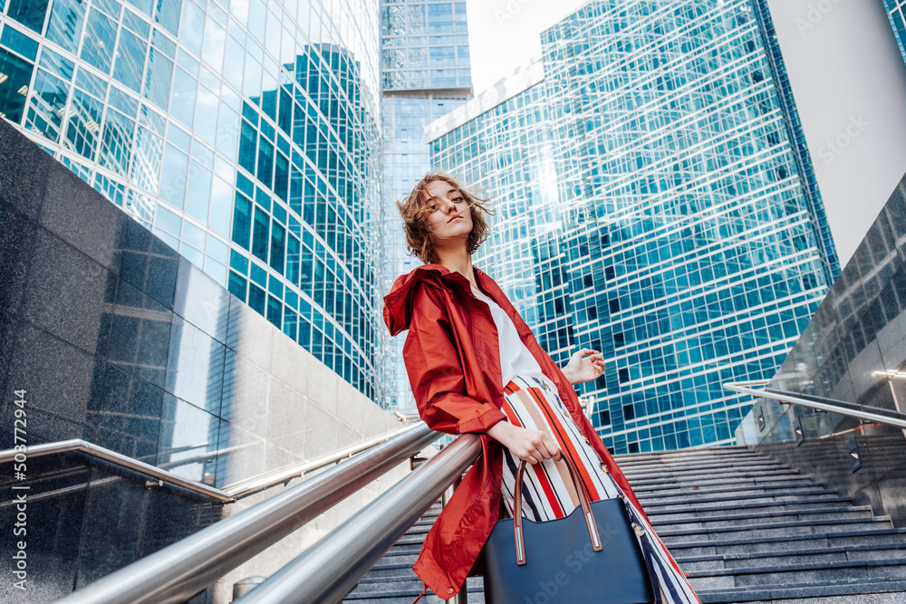 Beautiful girl is smelling a bouquet of flowers of sunflowers. Hair ...