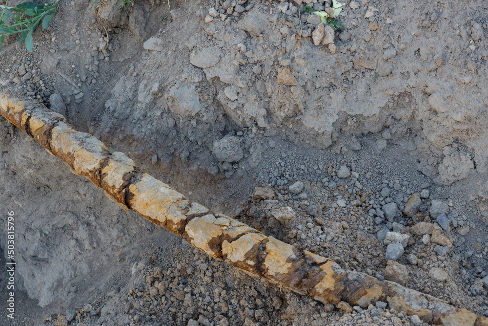 Very old earth cable, dug out of the ground. Corrosion marks on old ...