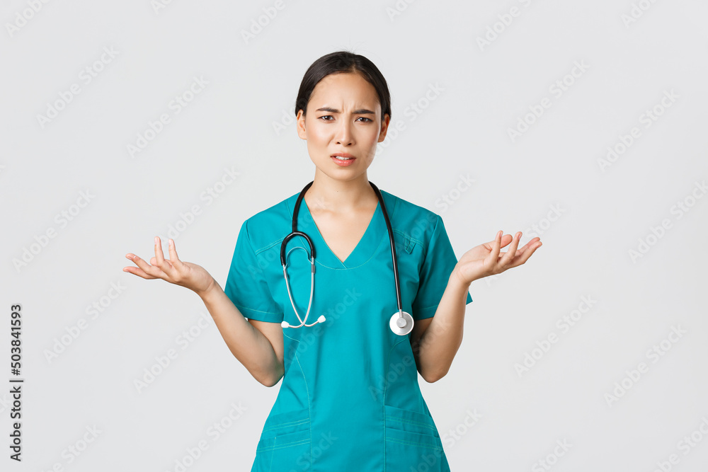 Covid-19, healthcare workers, pandemic concept. Confused and ...