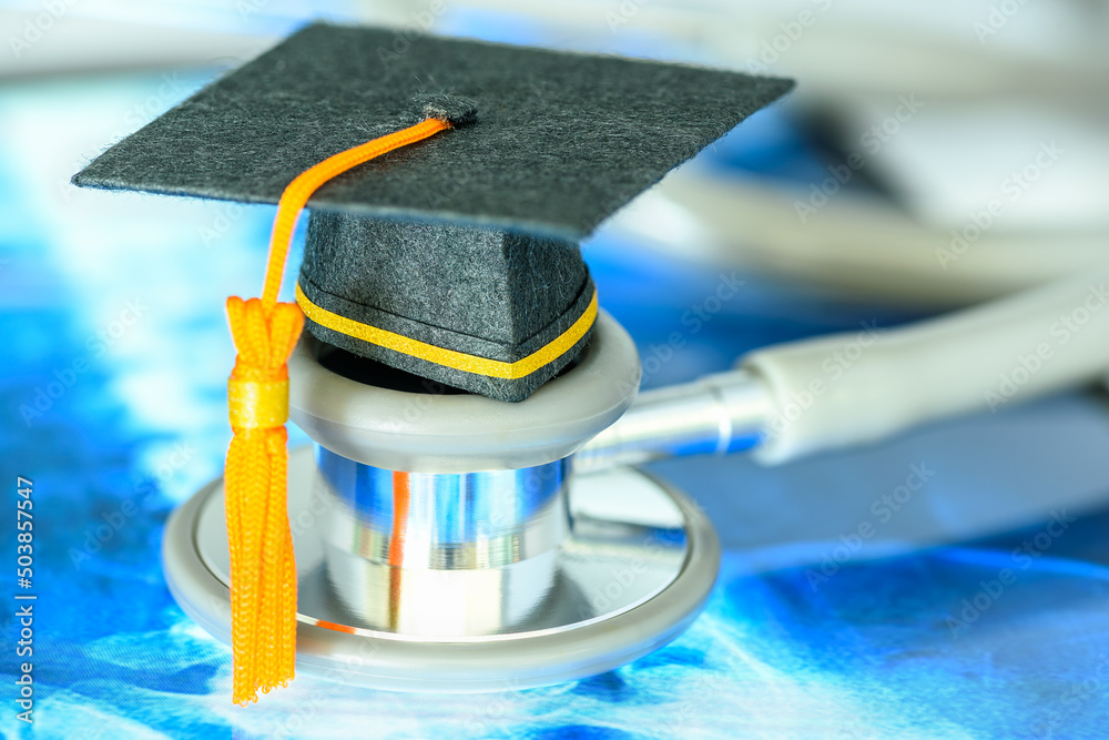 Study medicine degree abroad, healthcare concept : Graduation cap and a ...