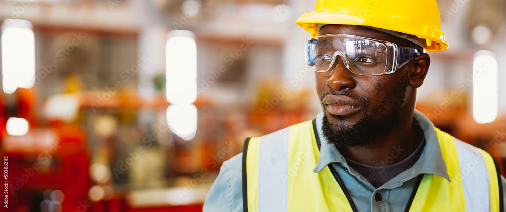 industrial engineer worker wiping the sweat away from forehead taking ...